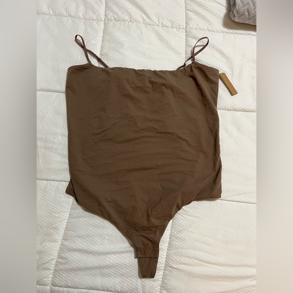 SKIMS | Tops | New With Tags Skims Body Suit | Poshmark